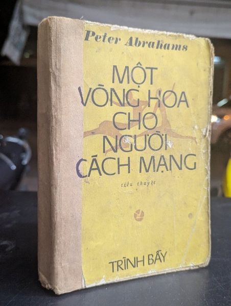 Một vòng hoa cho người cách mạng - Peter Abrahams – Momo Bookstore